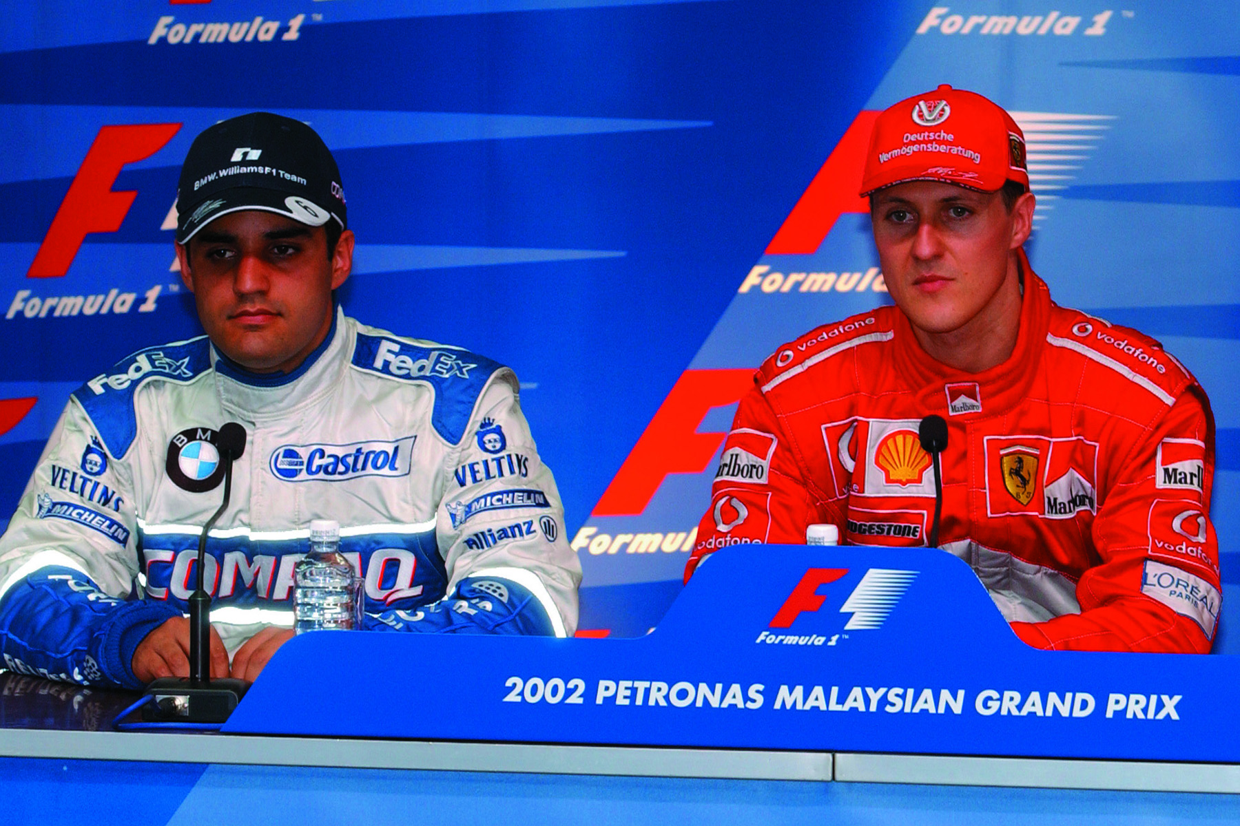 Juan Pablo Montoya und Michael Schumacher. Credit: BMW